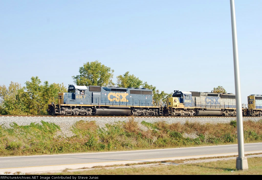 Q525 CSX 8367,8042,8059 stopped after peeling a pickup trucks bumper away. The engineer looks ...